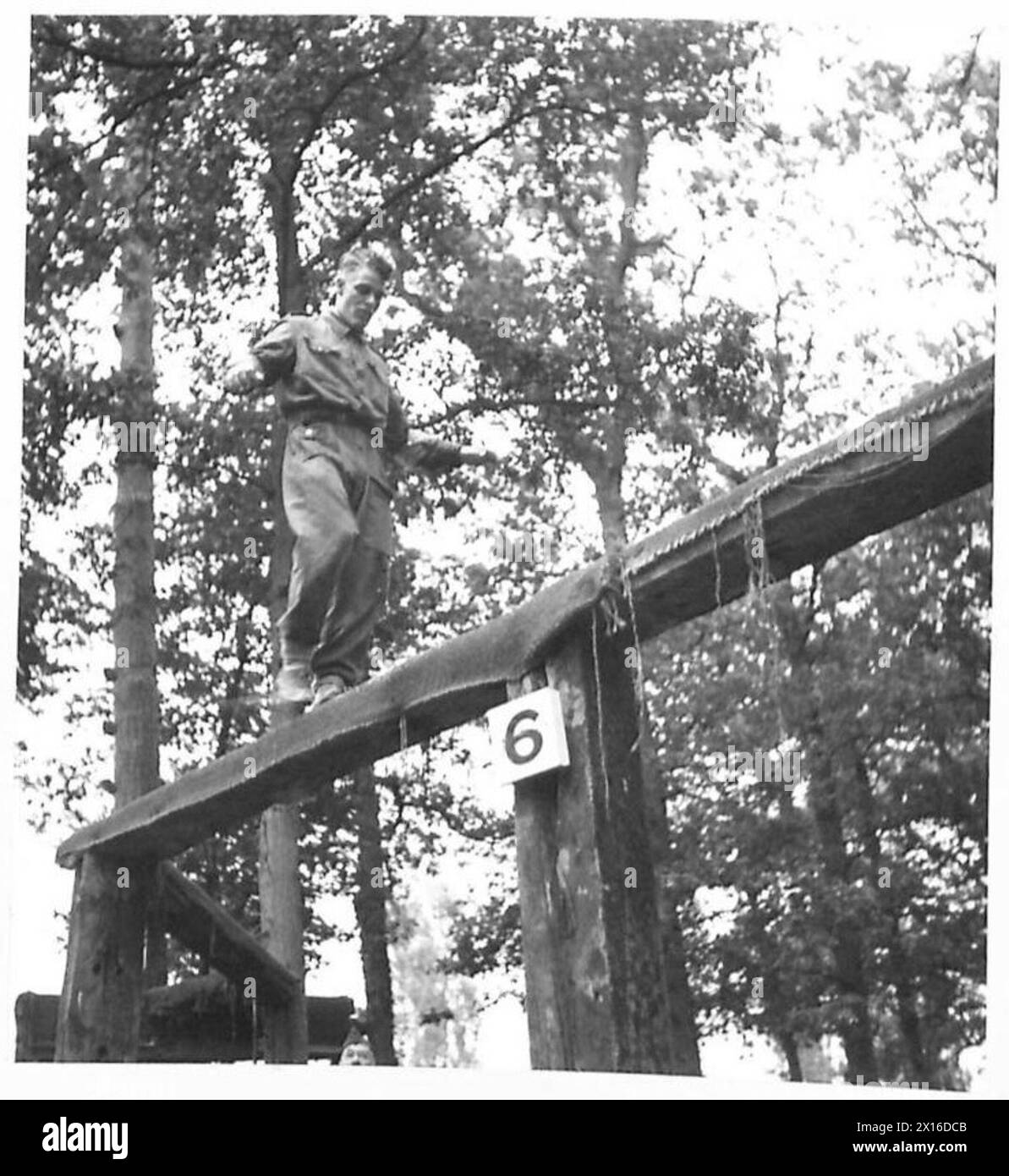 A candidate negotiates the 6th obstacle during assessment at the War ...