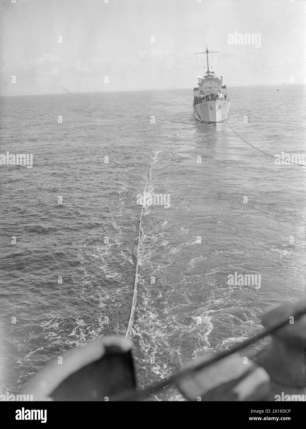 OILING AT SEA TRIALS WITH NEW TYPE RUBBER HOSE (FLOATING). 1942, ON ...