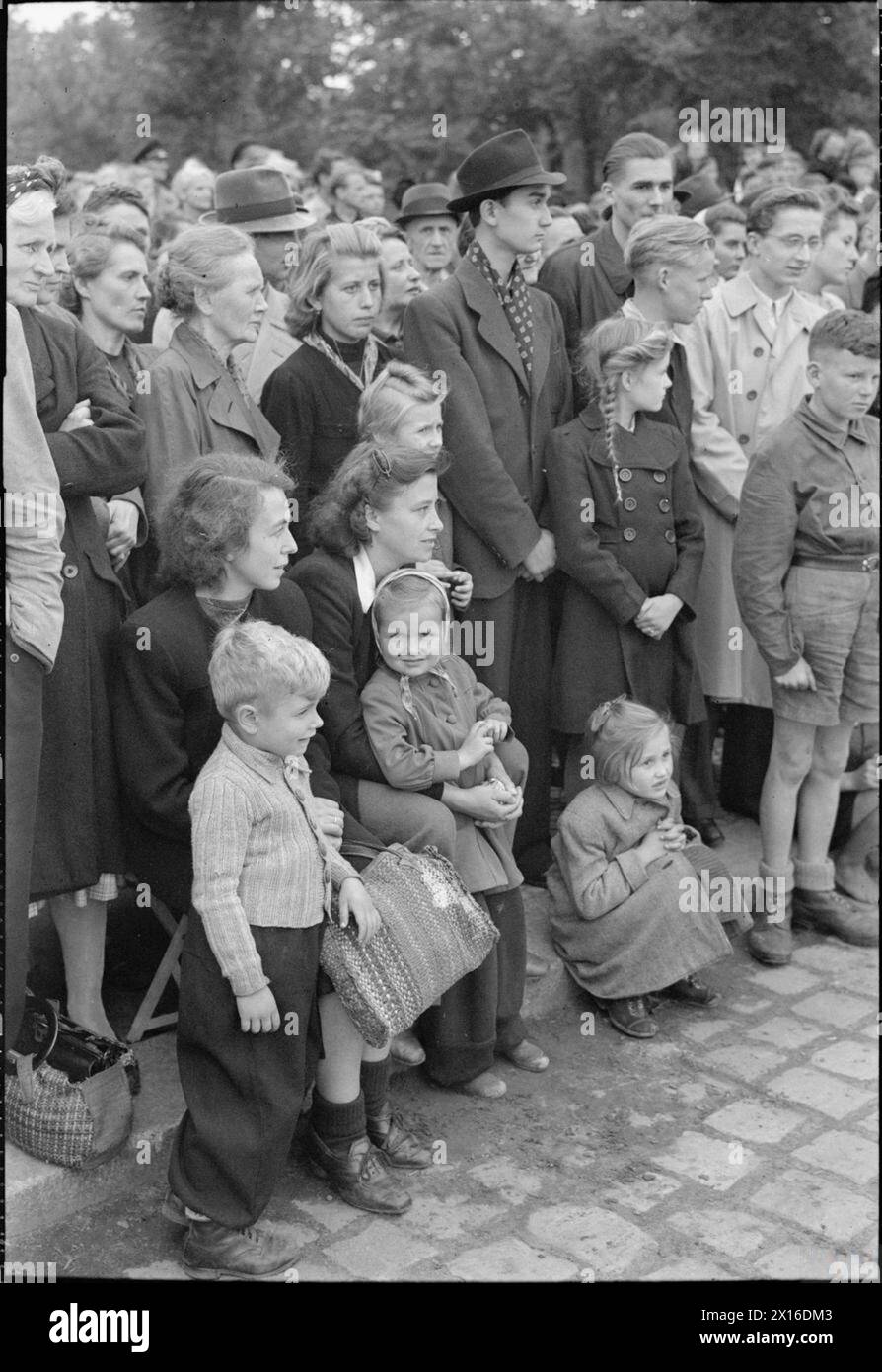GERMANY UNDER ALLIED OCCUPATION - German civilians watch the entry of ...