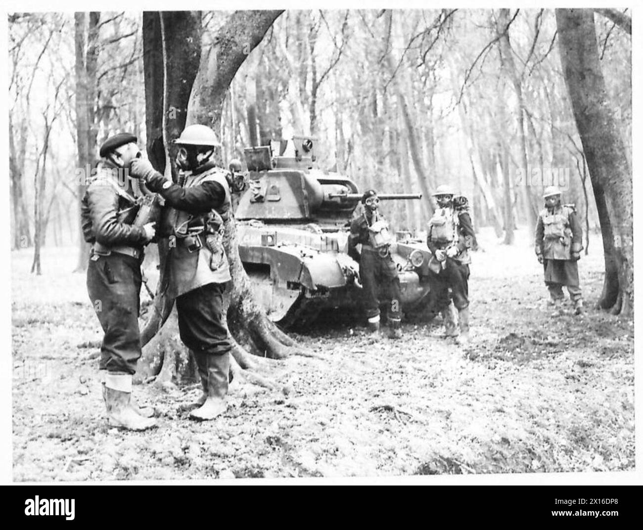TANK EXERCISE - Gas masks being worn during a gas alert. The tank is an ...