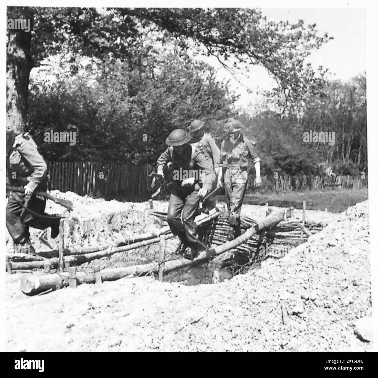 Troops participate in an assault course while Members of Parliament ...