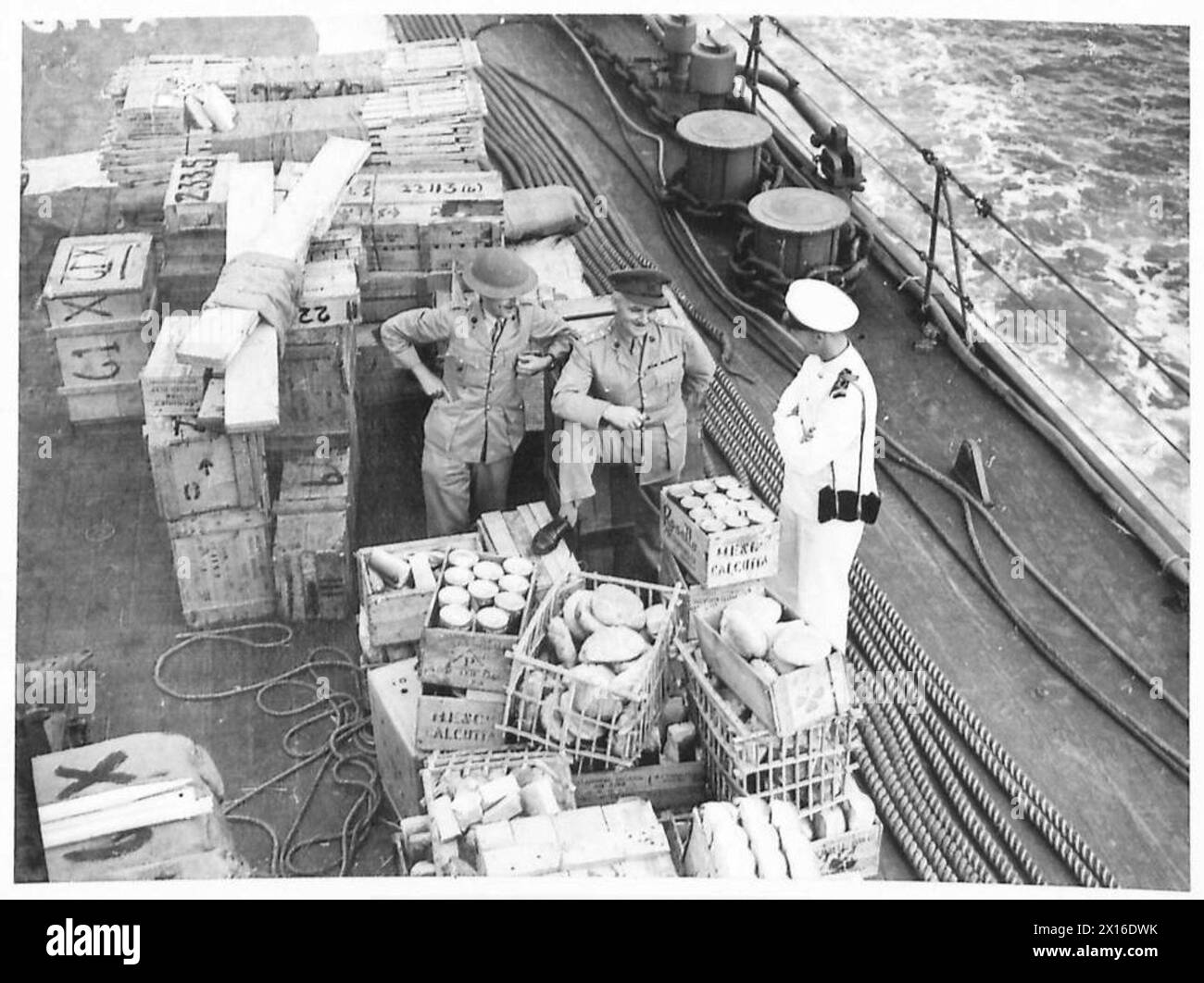 British Army troops embark and arrive at Crete aboard a warship, with ...