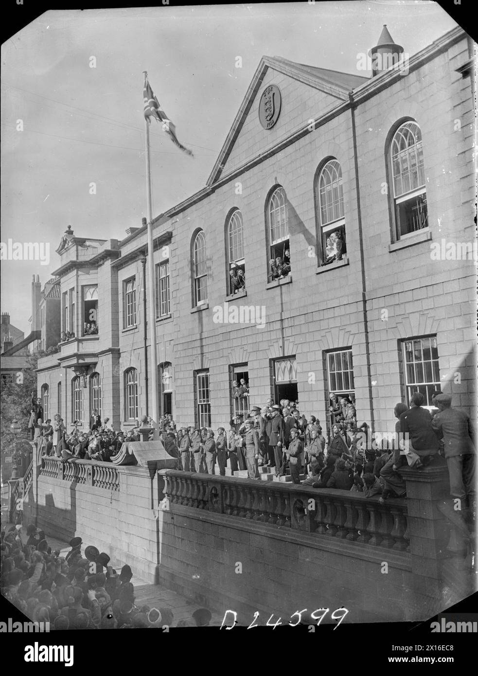 Crowds celebrate the liberation of the Channel Islands in 1945 as ...