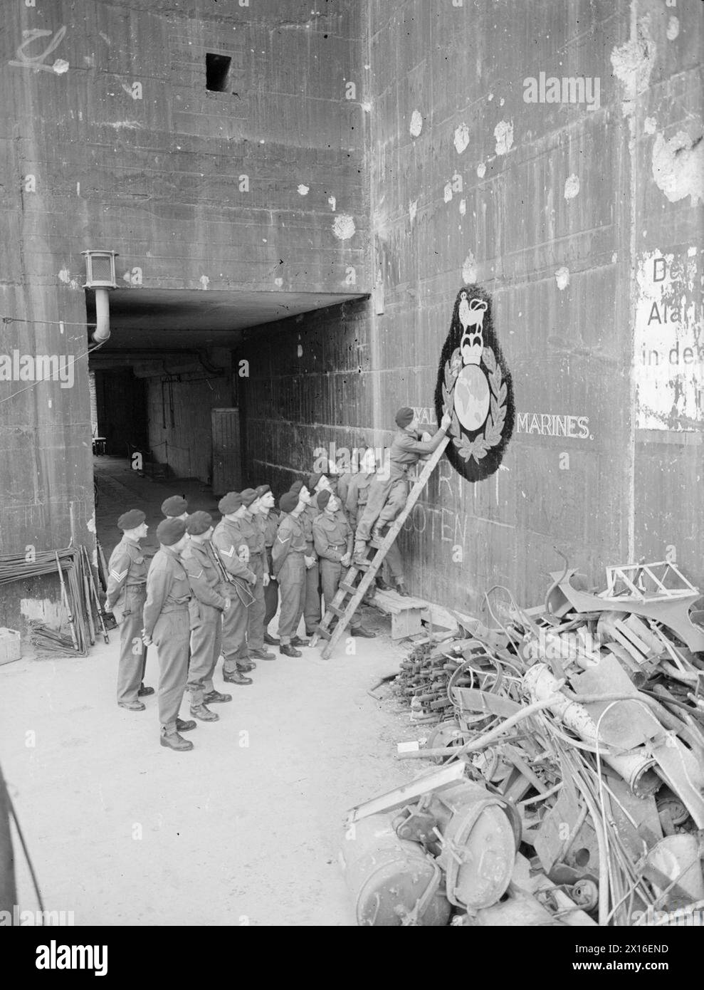 In May 1945, Royal Marines were stationed at Kiel naval base, observing ...