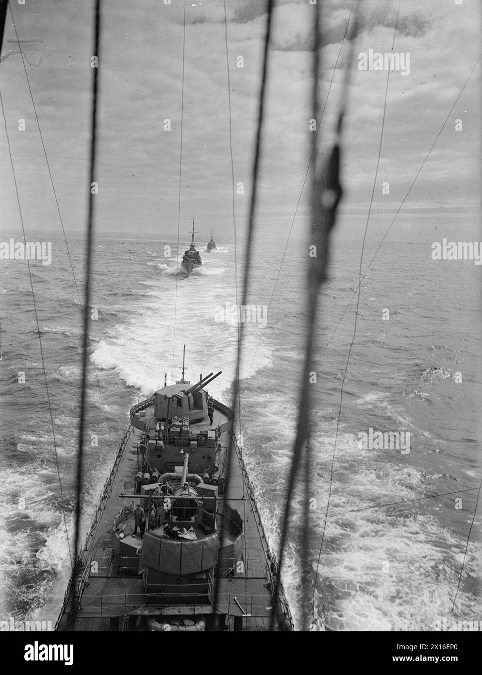 Photographs from the crows nest of HMS Kelvin showing bow waves and ...