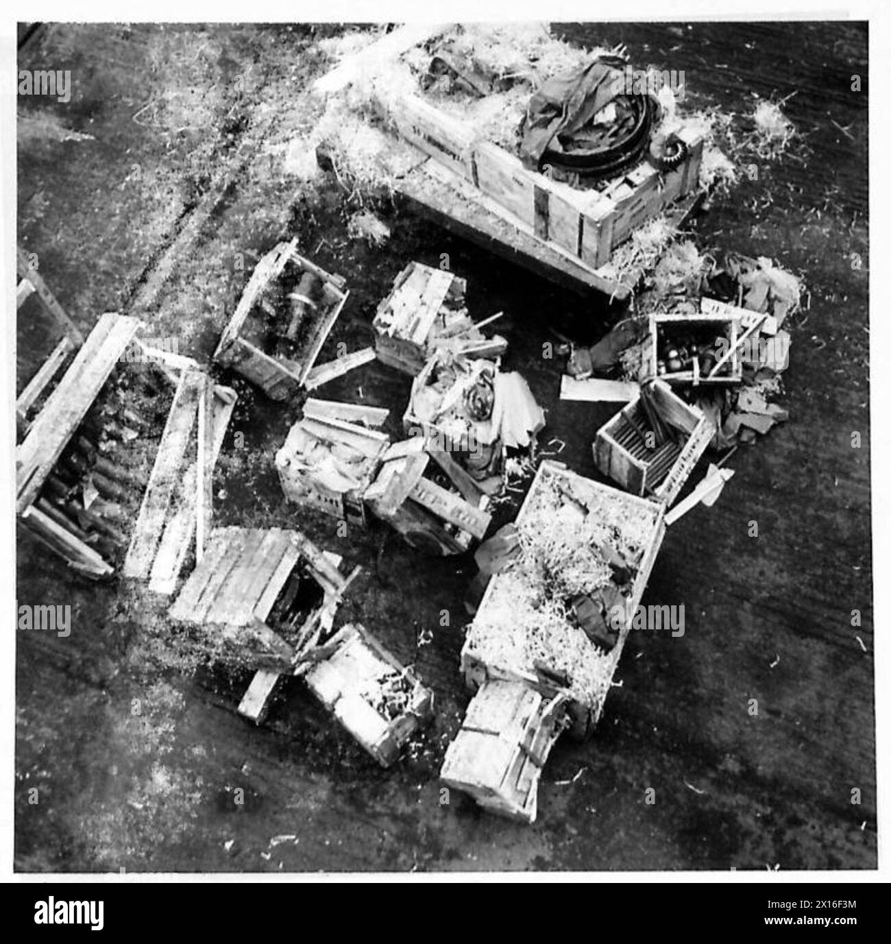 DAMAGED MACHINERY - Damaged packing cases and machinery photographed at ...