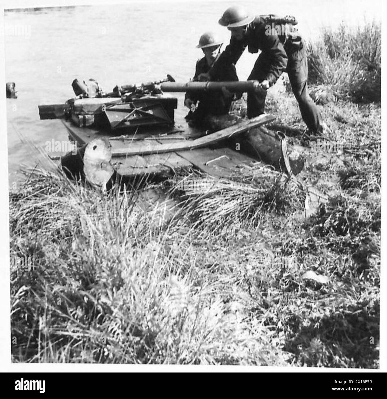 IMPROVISATION - Unloading the mortar from the raft , British Army Stock ...