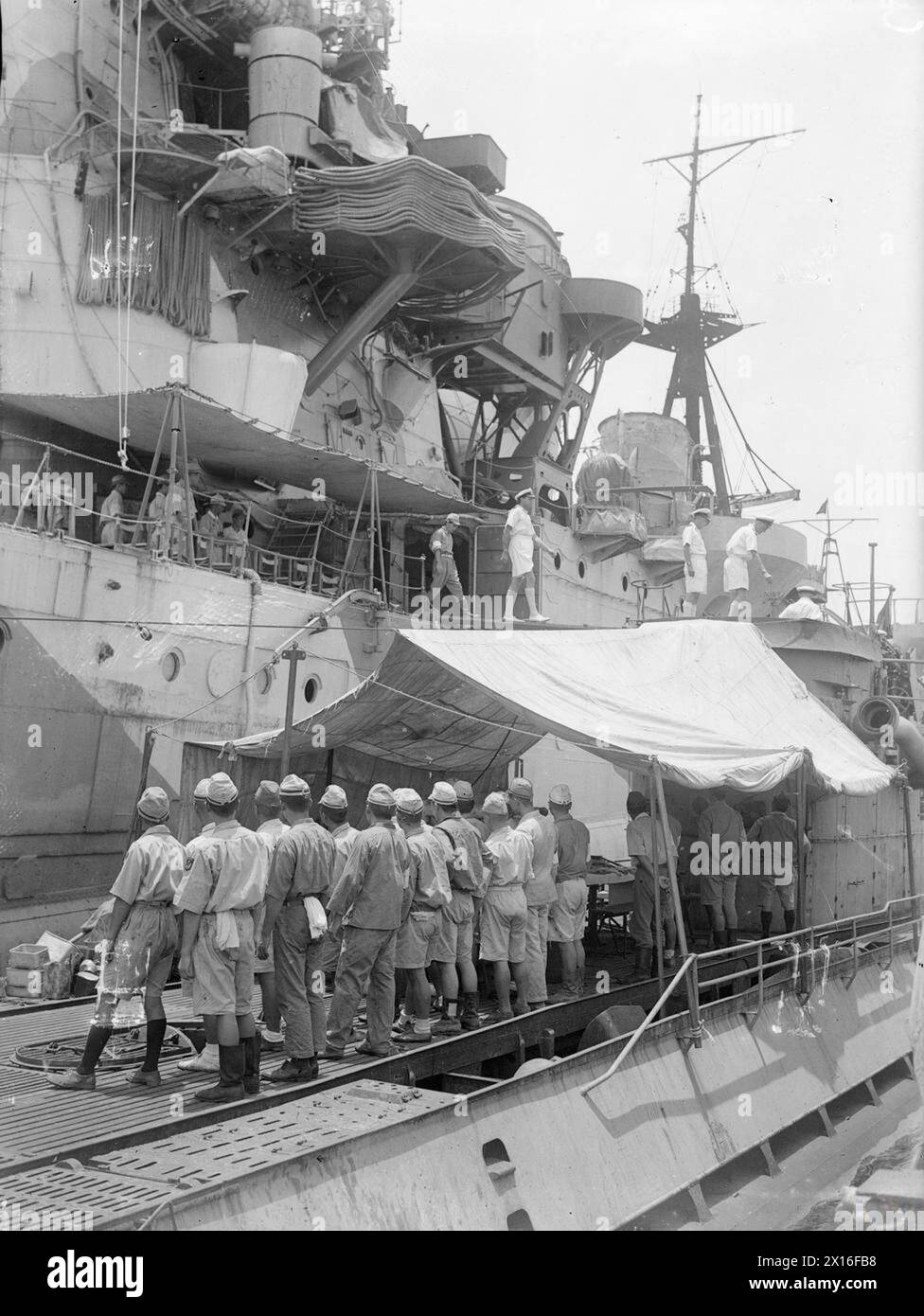 CAPTAIN POWER VISITS DAMAGED JAPANESE CRUISER. 25 SEPTEMBER 1945 ...