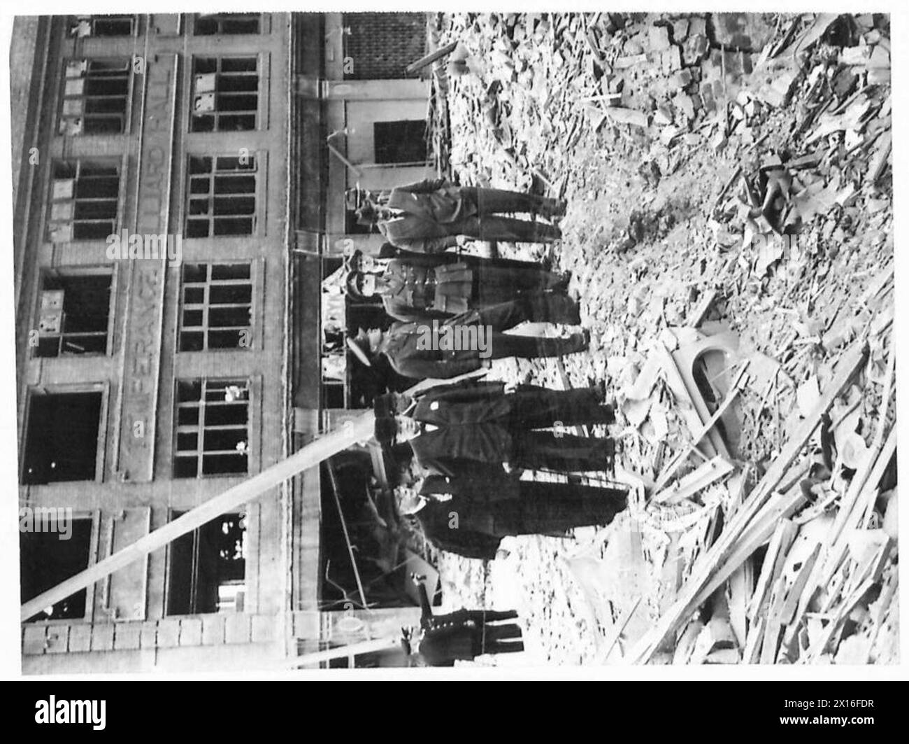 Prime Minister Winston Churchill visited a bombed area of London ...