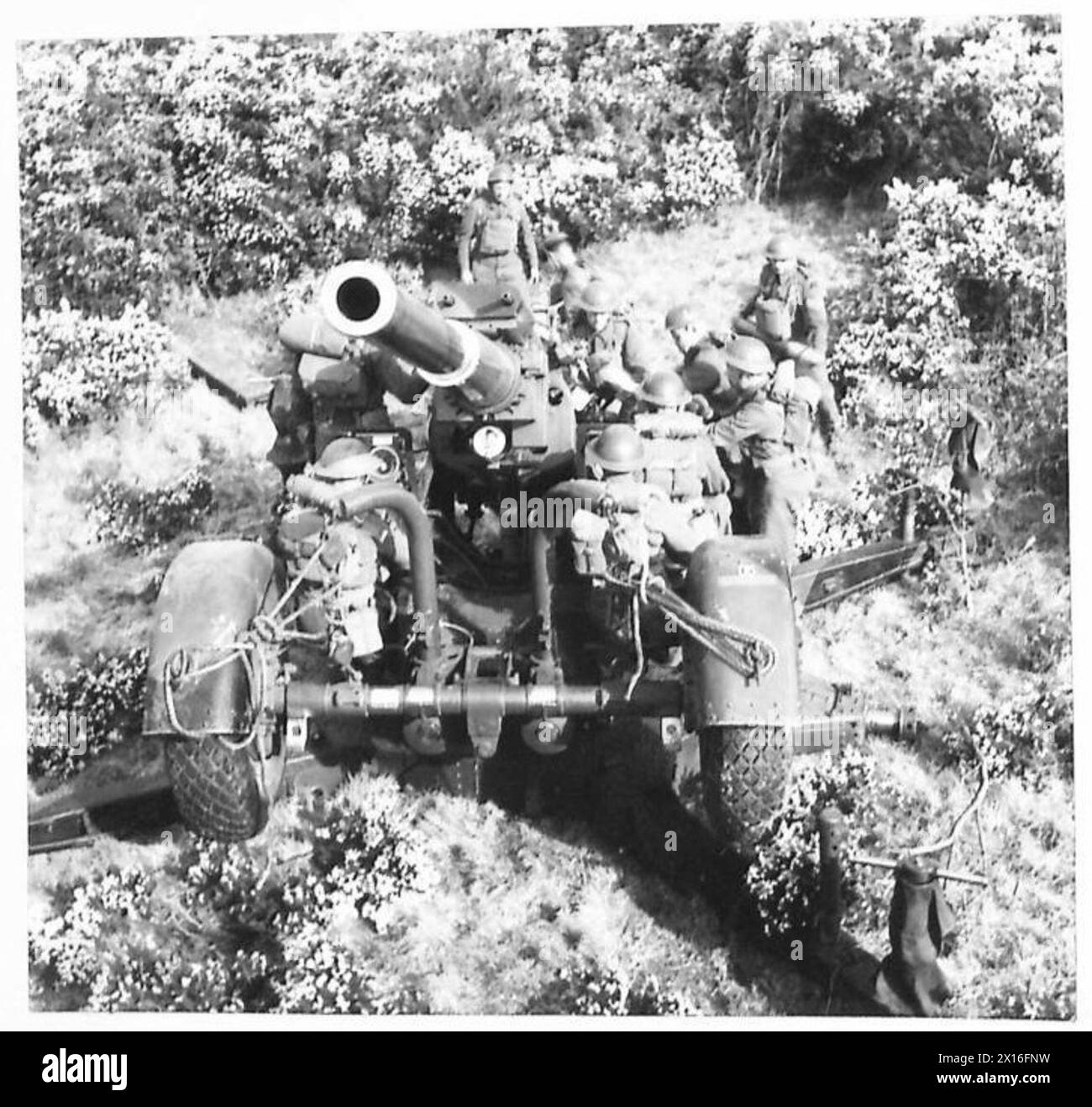 AA GUNNERS IN TRAINING - Looking down on the gun detachment in action ...