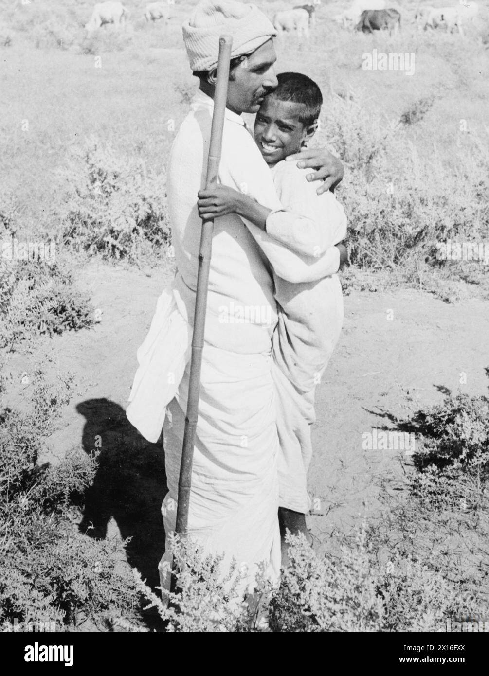 P.O.W. COMES HOME - Sher Mohd embraces his nephew. He last saw the ...