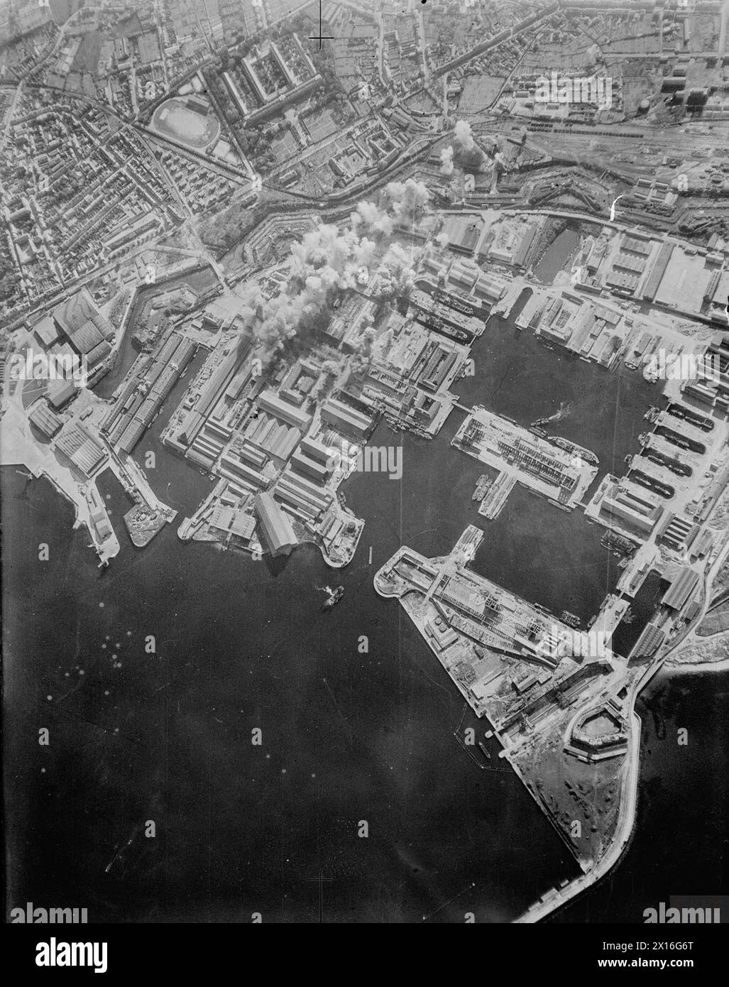 ROYAL AIR FORCE BOMBER COMMAND, 1942-1945. - Bombs burst on dockside ...