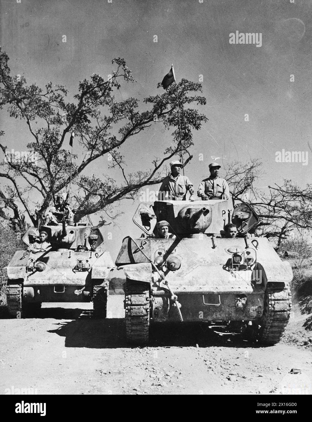 Chinese troops operate US Stuart tanks on the Ledo Road during the ...