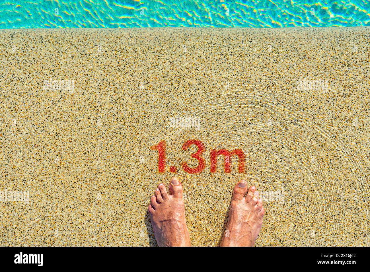 two feet at the pool entrance with a depth indication of 1.3 meters ...