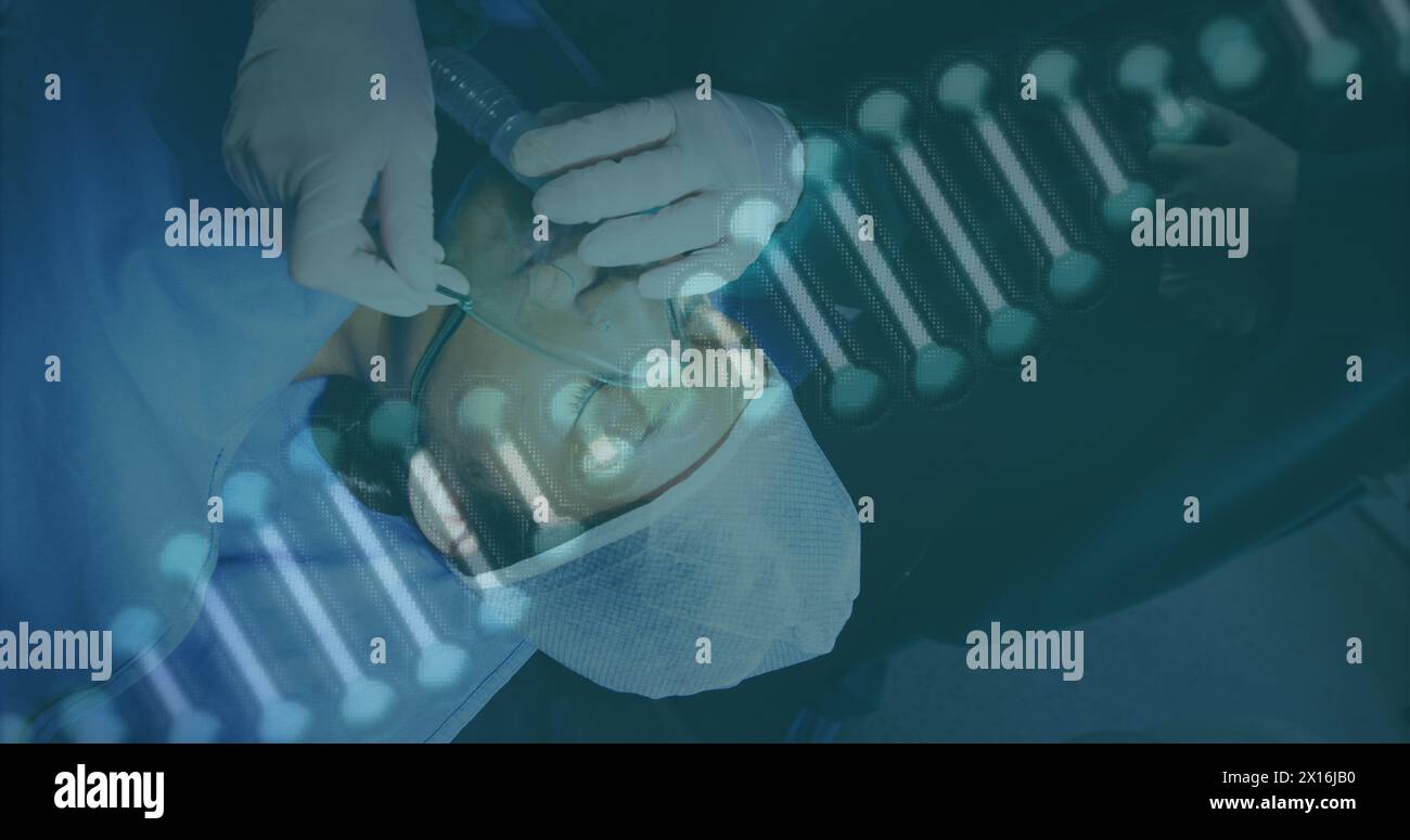 Image of dna strand spinning over caucasian male patient with oxygen ...