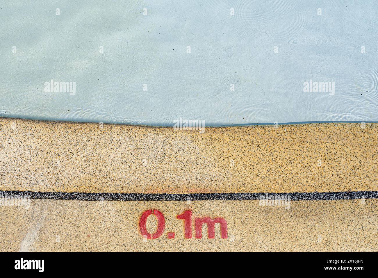 Entrance to the pool with a depth indication of 0.1 meters Stock Photo ...
