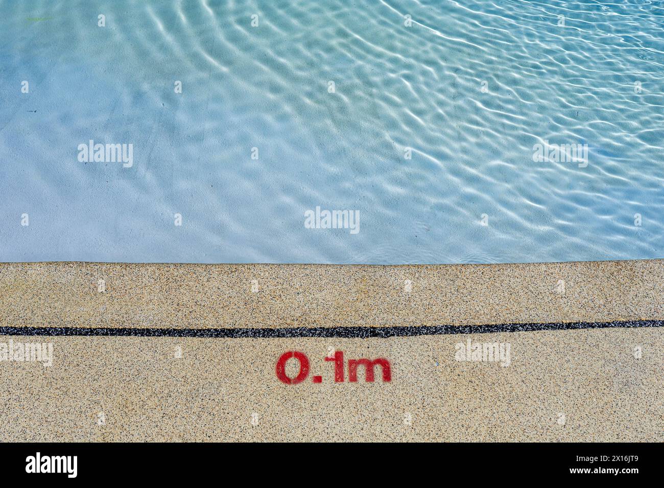 Entrance to the pool with a depth indication of 0.1 meters Stock Photo ...