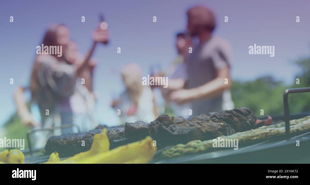 Image of happy caucasian group of friends dancing and having bbq Stock ...