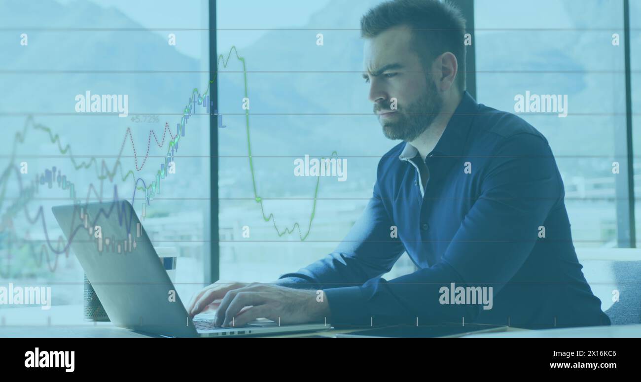 Image of financial data and graphs over focused caucasian businessman ...