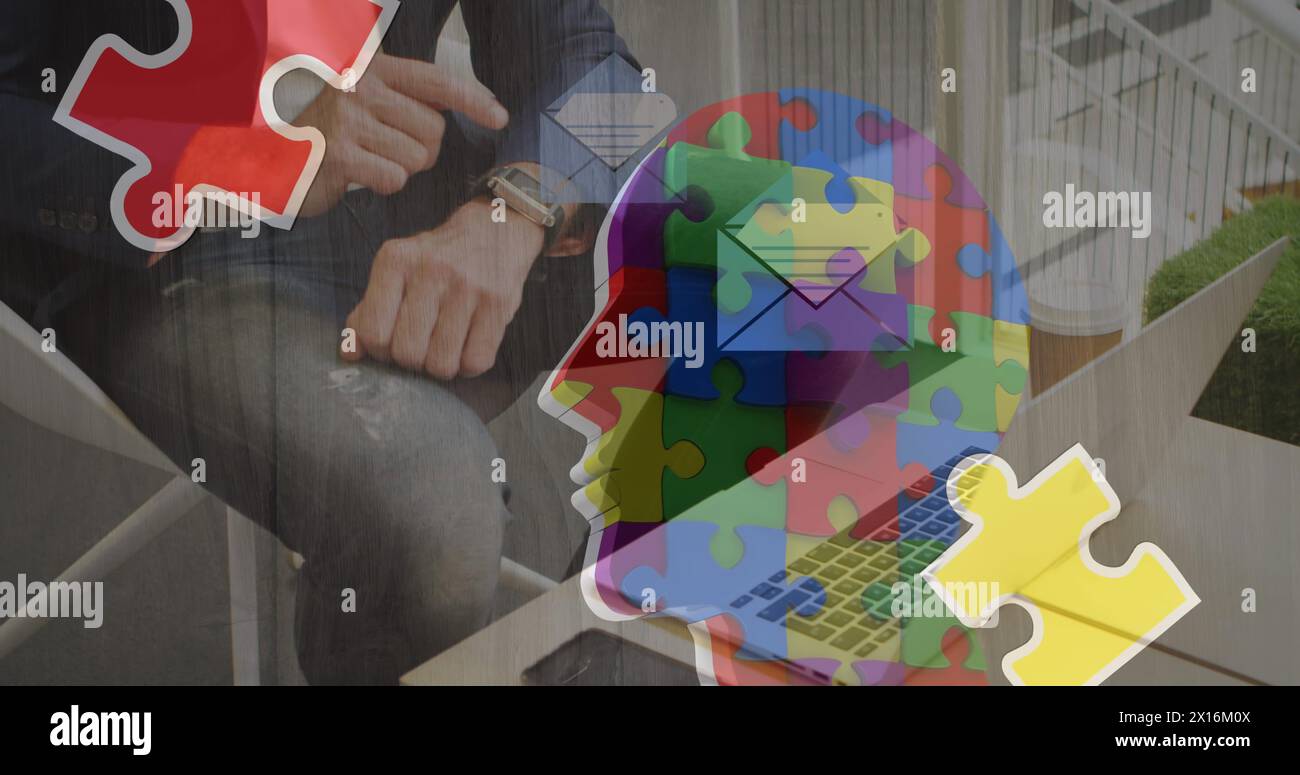 Image of colourful puzzle over caucasian businessman Stock Photo - Alamy