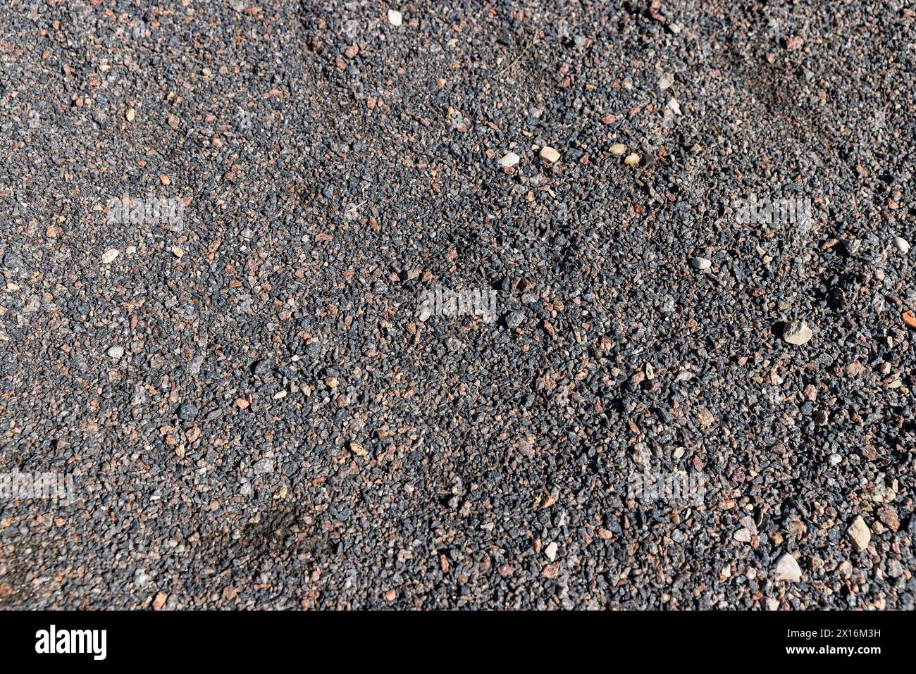 a pedestrian walkway in the park made of rubble and stones, an eco ...