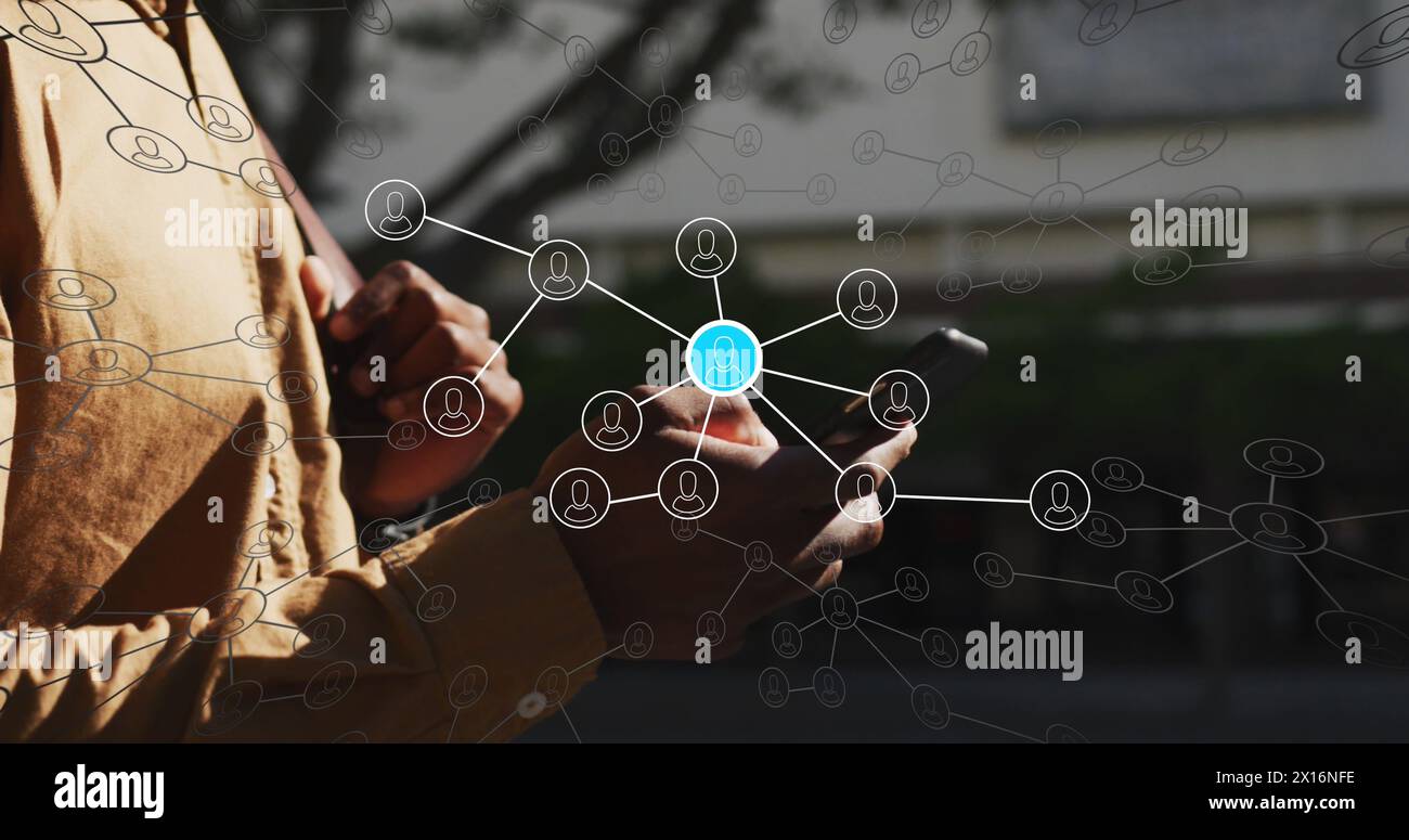 Image of network of connections with icons over african american man ...