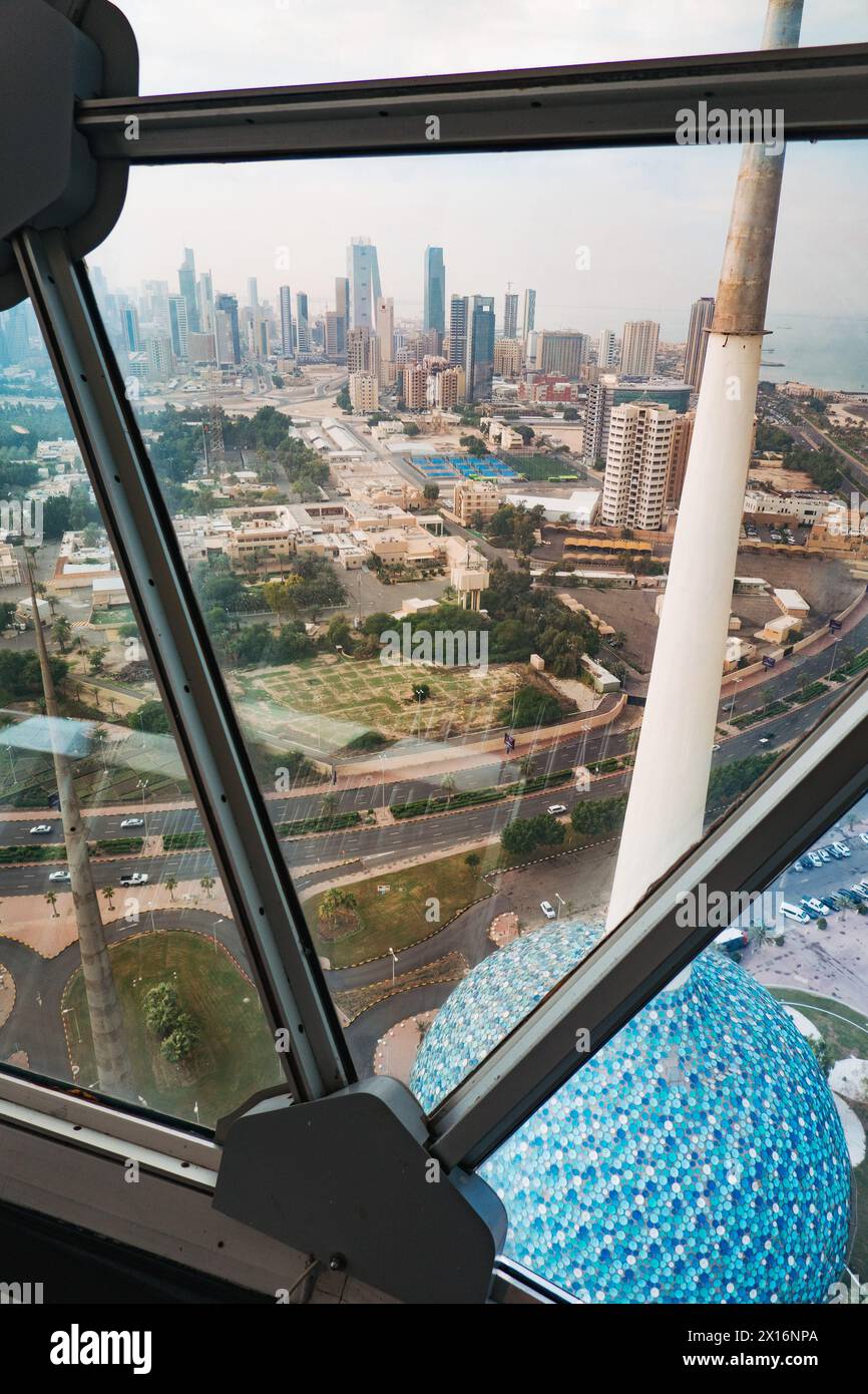looking out over the lower sphere and the city skyline from the Kuwait ...