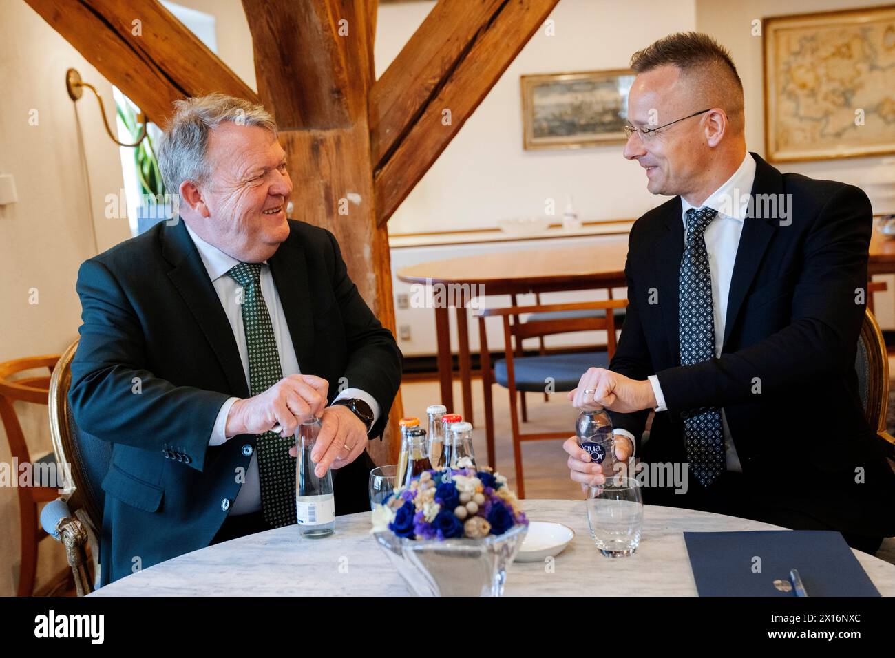Denmark's Foreign Minister Lars Loekke Rasmussen, left, and Hungary's ...