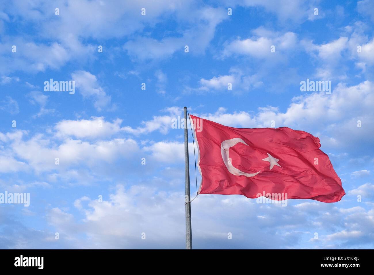 Turkish flag waving with cloudy sky background. National symbol of ...