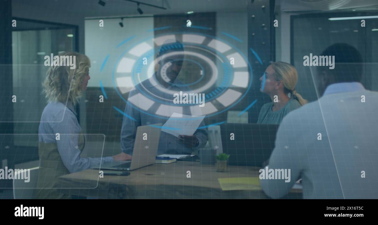 Image of interface with data processing over diverse colleagues ...