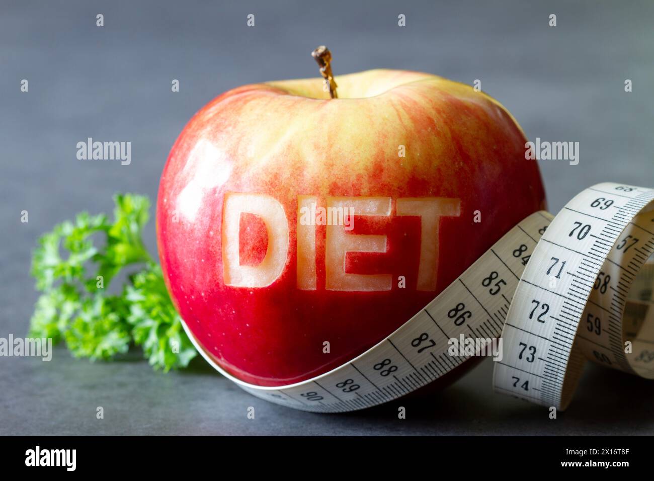 Red apple with cut-out word diet and measuring tape, diet and healthy ...