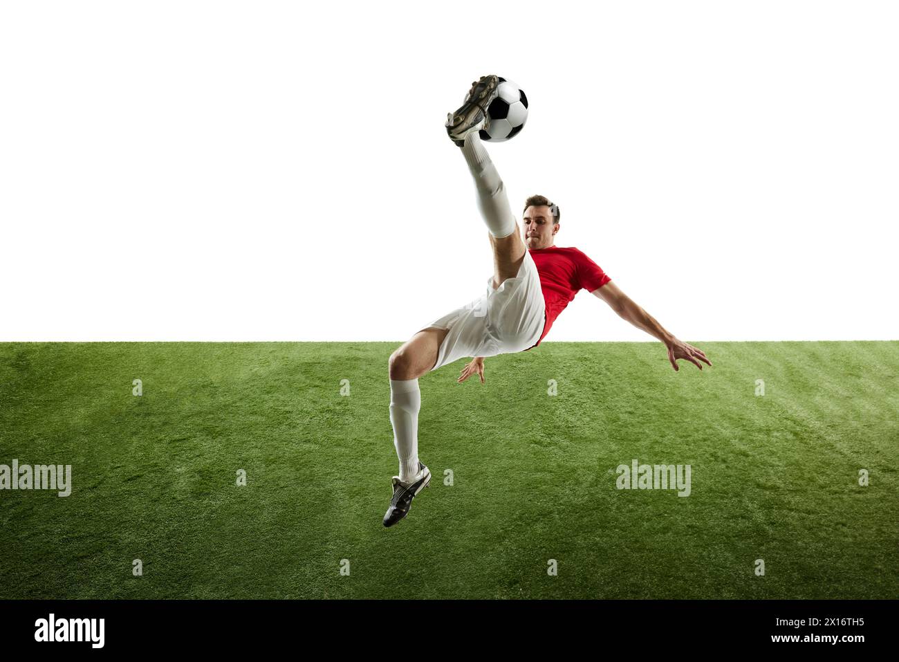 Motivated young man, football player in motions during game, training ...