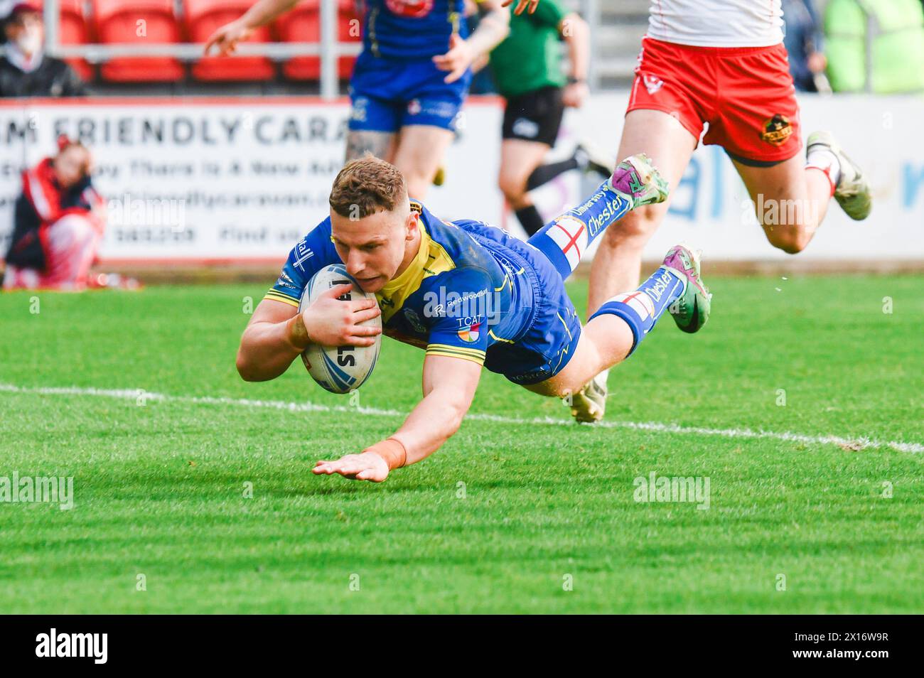 George Williams of Warrington Wolves celebrates try against St Helens ...