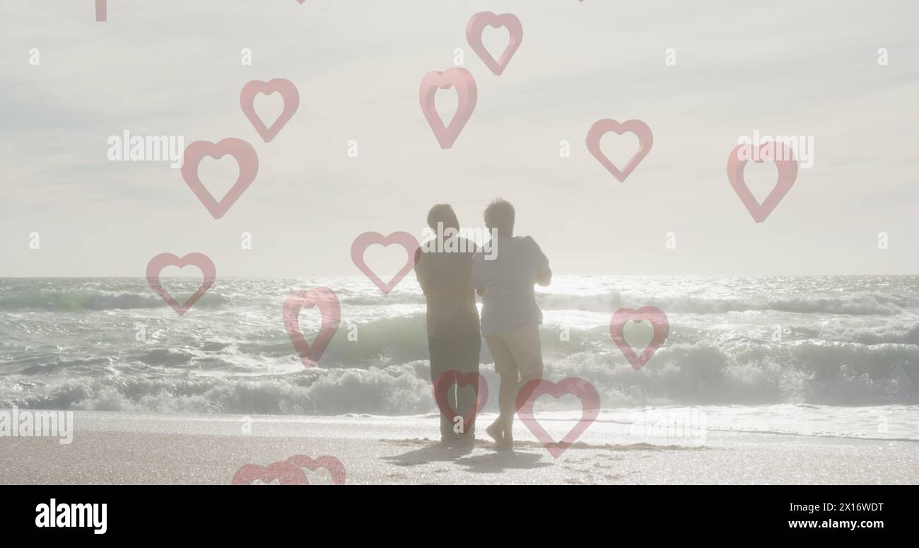 Image of red hearts over couple in love dancing on beach Stock Photo ...