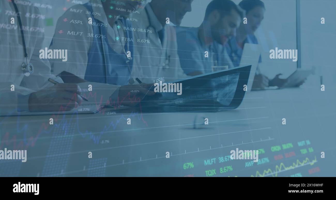 Image of data processing over mid section of team of diverse doctors ...