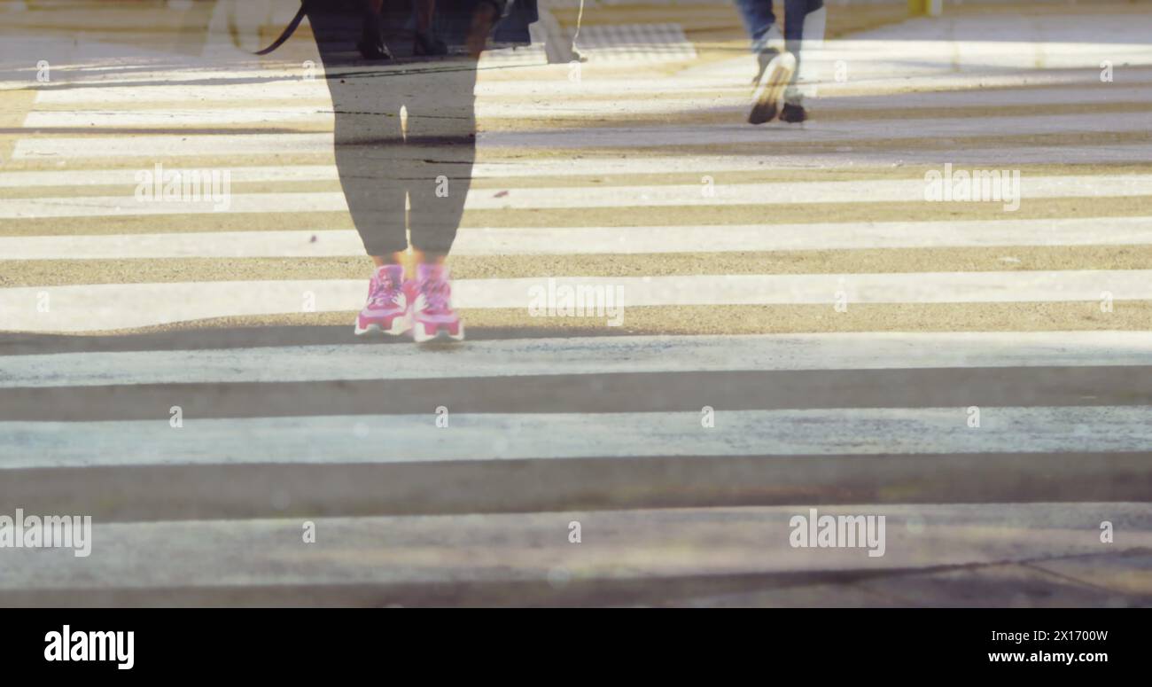 Image of commuters walking on zebra crossing on busy city street in ...