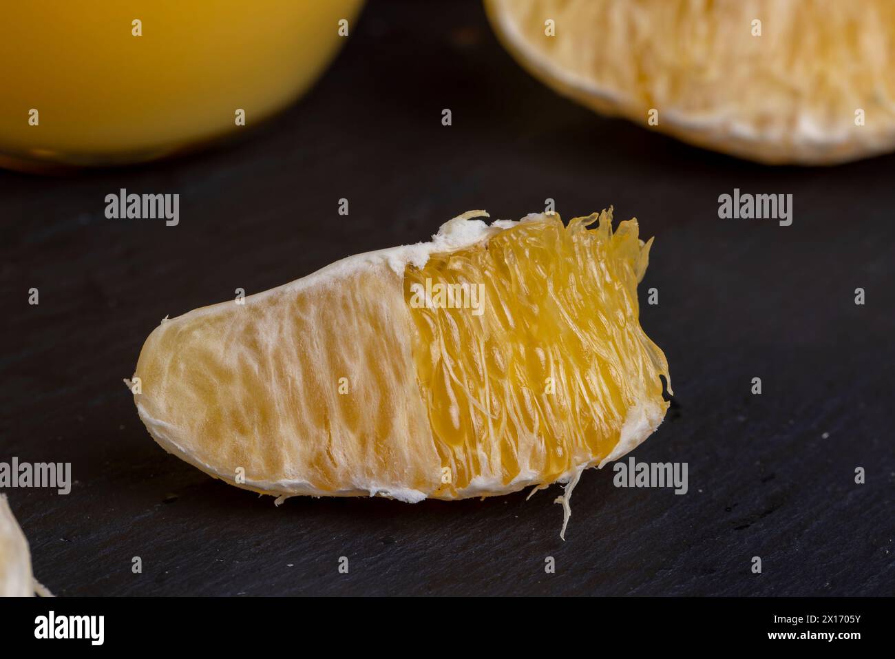 peeled orange slices on the table, juicy and delicious orange without ...