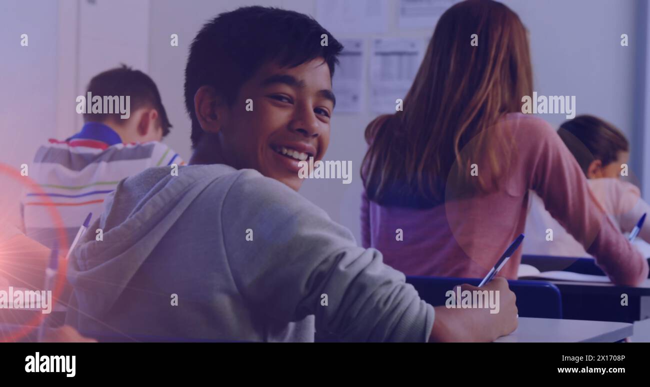 Image of back view of diverse students writing test at school Stock ...