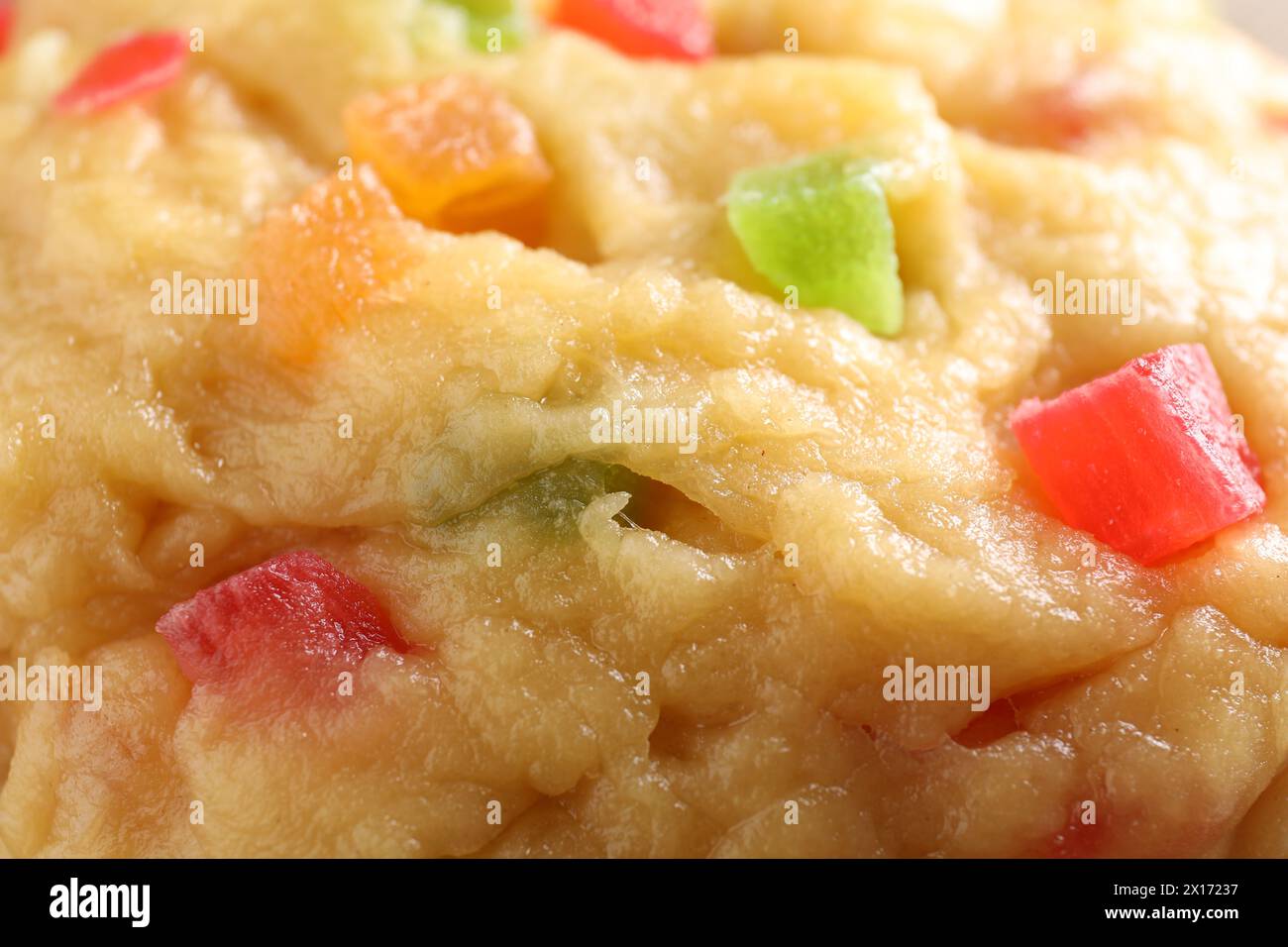 Texture of raw dough with candied fruits as background, closeup Stock ...