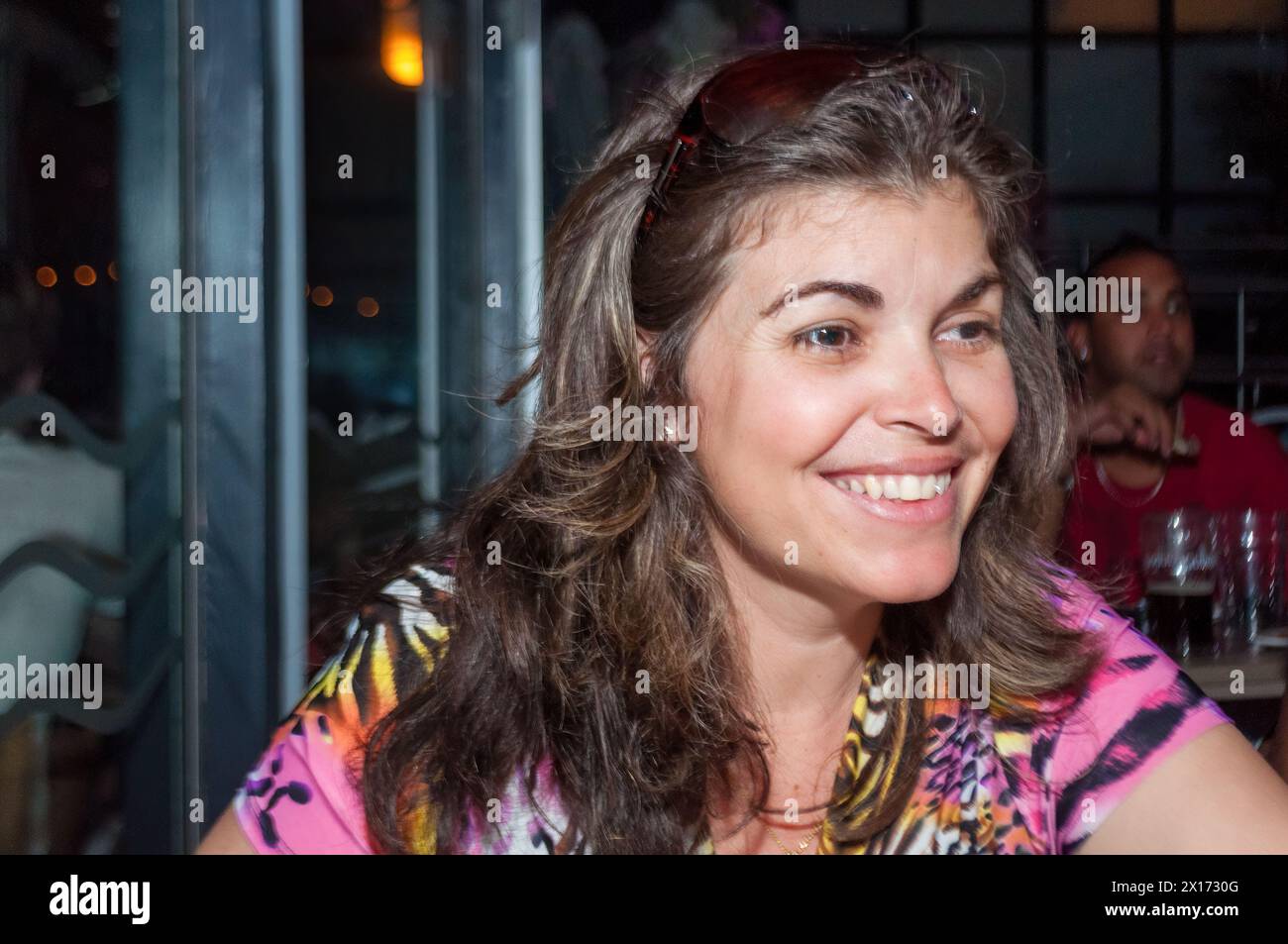 Cuban woman in a restaurant. Portrait of real people Stock Photo - Alamy