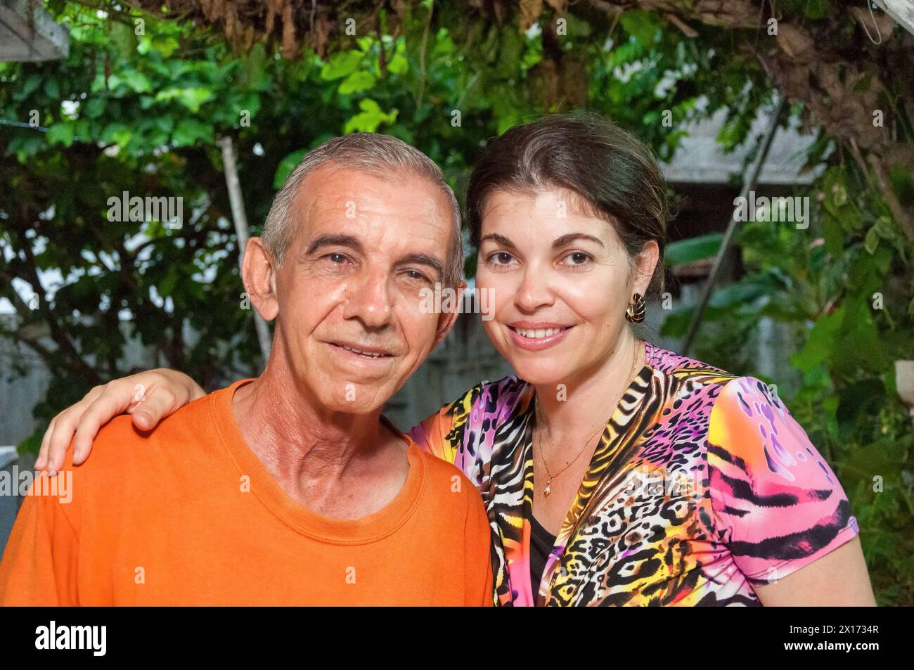 Father and daughter in background. Portrait of real Cuban people Stock ...