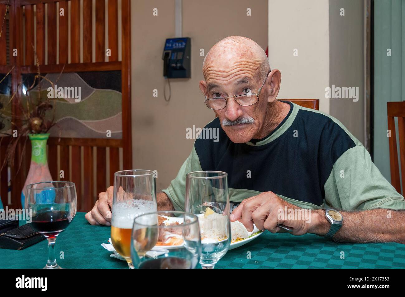 Senior man in restaurant. Portrait of real Cuban people Stock Photo - Alamy