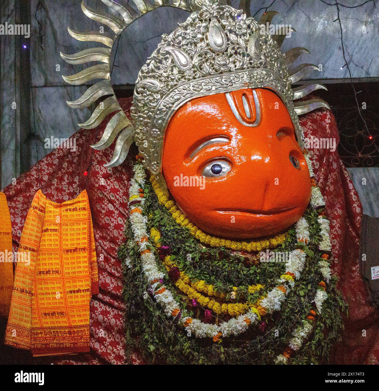 Orange statue of Hanuman in Varanasi, India Stock Photo - Alamy