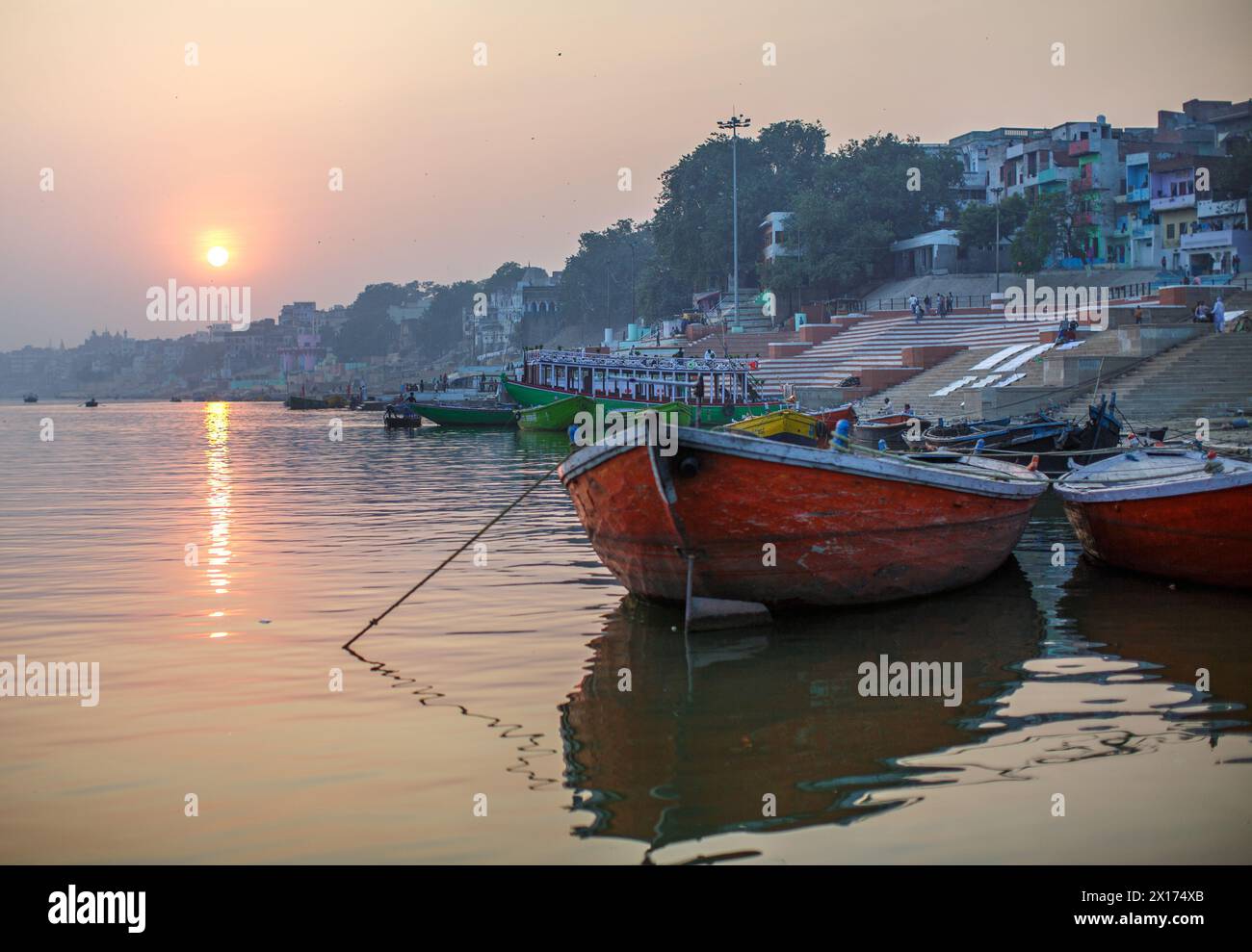 View from a boat of the Ganges riverside in Varanasi at sunset Stock ...