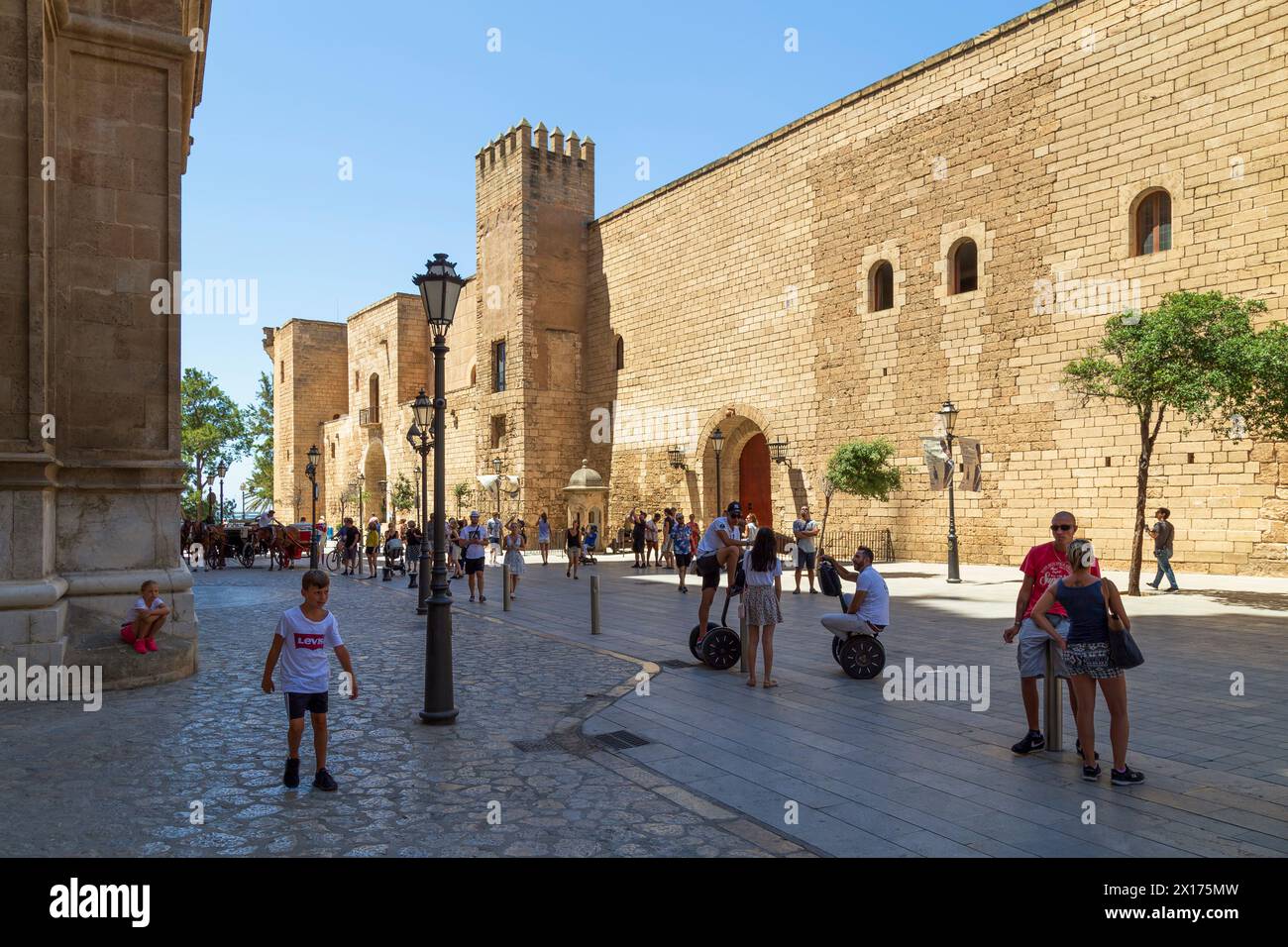 People walking through the old town of Palma de Mallorca Stock Photo ...