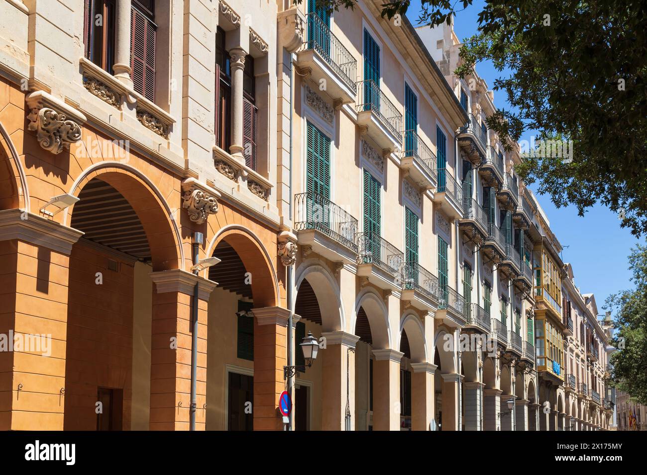 Facades with balconies of historic residential buildings in the center ...