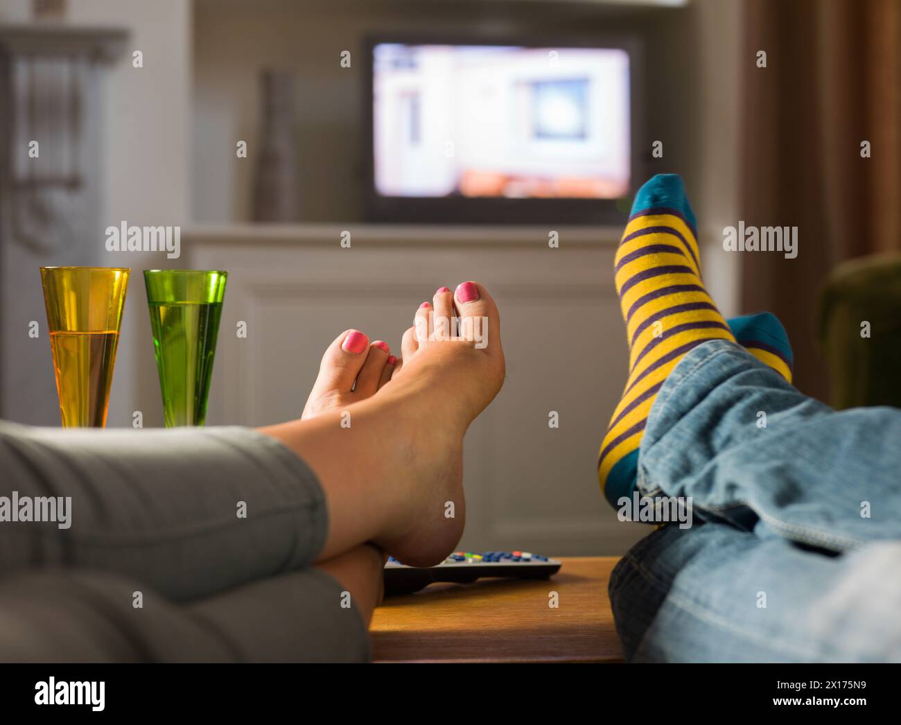 Feet up watching tv television hi-res stock photography and images - Alamy