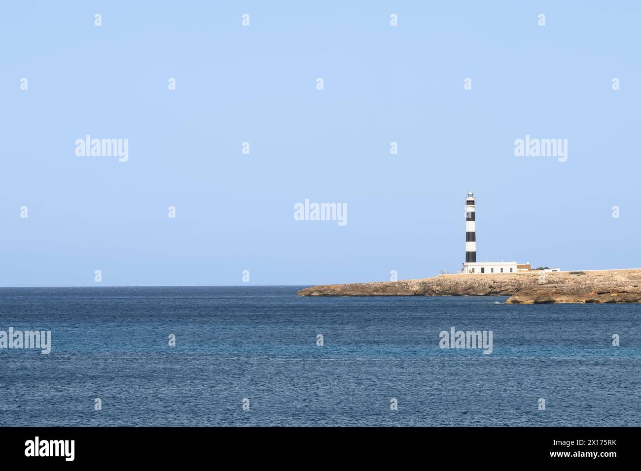 Lighthouse of Cap d'Artrutx near the town of Cala en Bosch in the ...