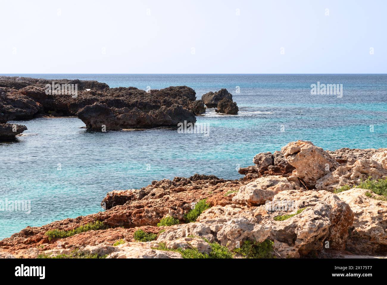 Limestone cliffs along the coast in the southwest of the Spanish island ...