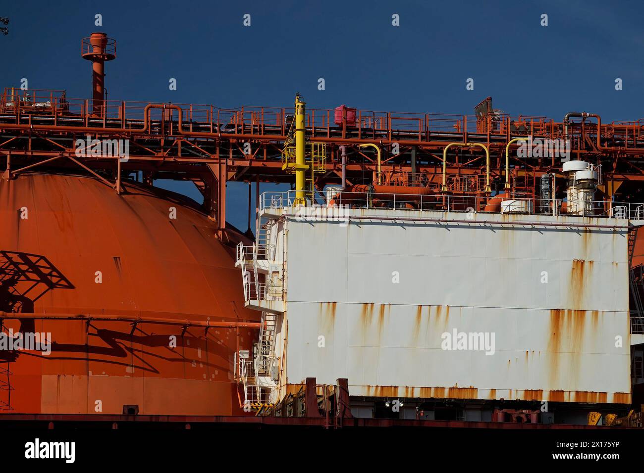 A regasifier ship LNG Liquified Natural Gas tanker anchored in Genoa Harbor, Italy Stock Photo ...